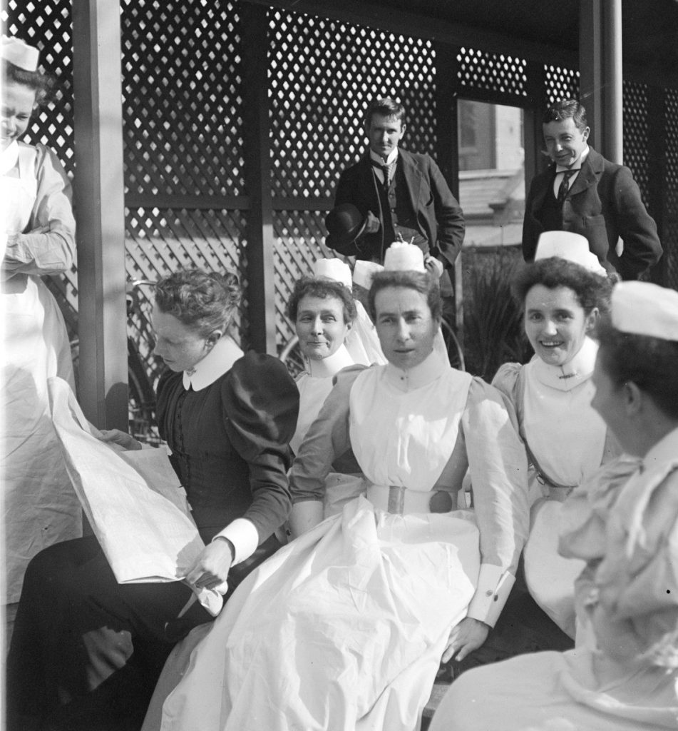 State Library Victoria – Group of nurses and men on a verandah